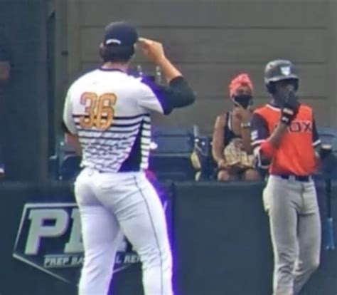 Bubble Butt Baseball Player Adjusts Crotch