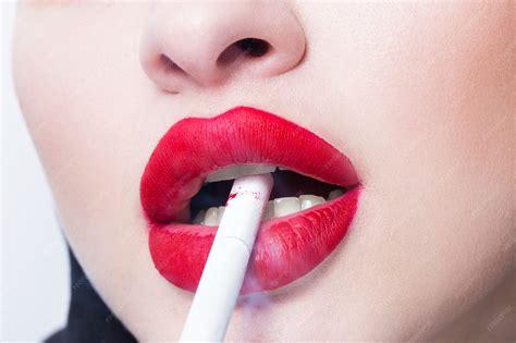 Premium Photo Girl With Red Lips And A Cigarette