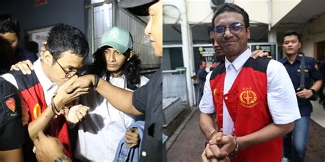 Portrait Of Vadel Badjideh Kissing His Fathers Hand And Hugging Him