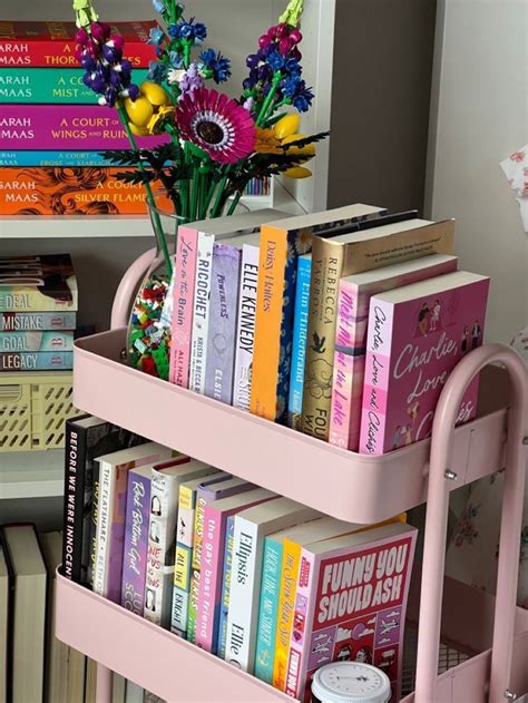Pink Book Cart Filled With Inspirational Books Book Cart Decor Ideas