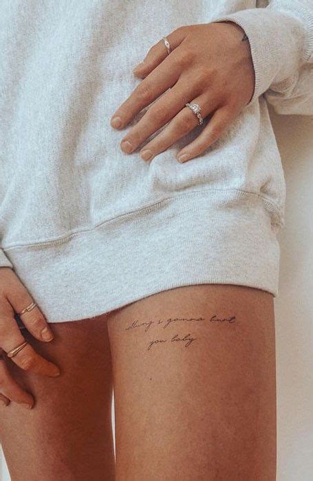 Above Knee Cursive Tattoo Script Tattoo Above Knee Dainty Tattoos