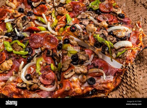 Medium Pizza With Black Olives Italian Sausage Linguica Mushrooms