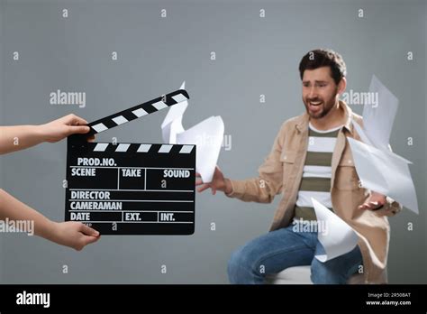 Emotional Actor Performing While Second Assistant Camera Holding