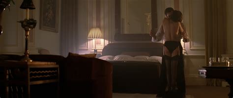 Teri Hatcher Stuns In Garter Belt And Stockings In Tomorrow Never Dies