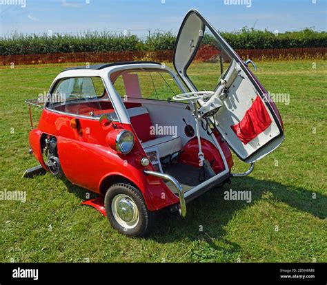 Classic Red And White Bmw Isetta 300 3 Wheeled Bubble Car Parked On