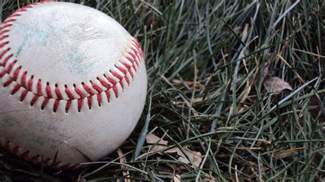 Baseball In Grass Free Photo Download Freeimages