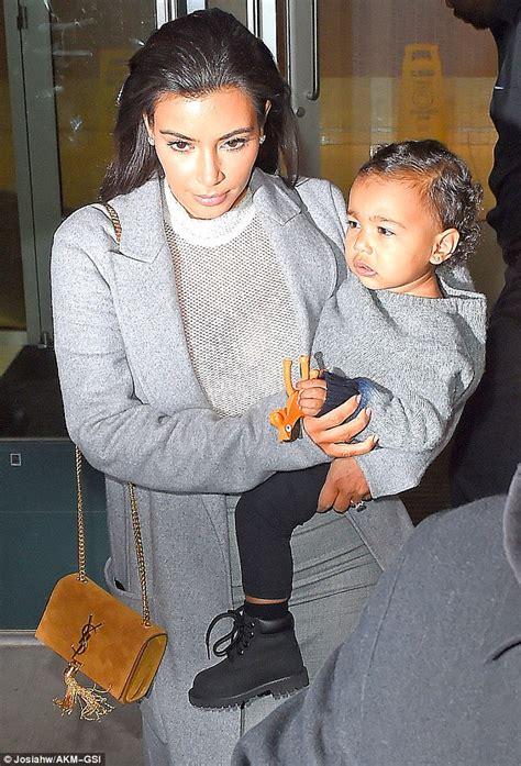 North West Gets Extra Attention From Kim Kardashian As She Grips Pokey