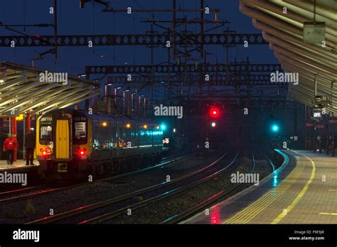London Midland Class 350 Electric Train At Rugby Station At Night
