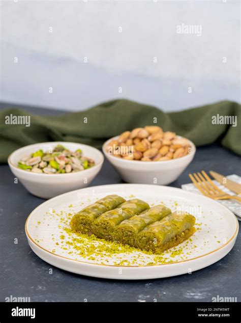 Pistachio Baklava On White Marble Traditional Middle Eastern Dessert
