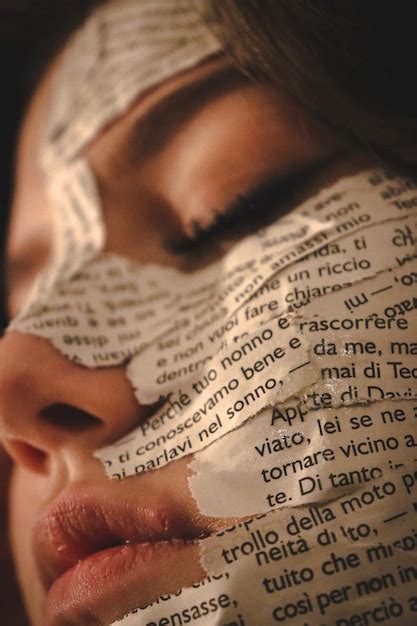 Premium Photo Close Up Of Teenage Girl With Paper On Face
