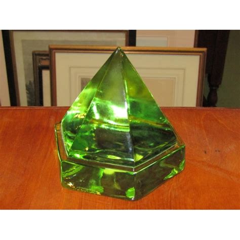 A Green Glass Hexagonal Prism Paperweight