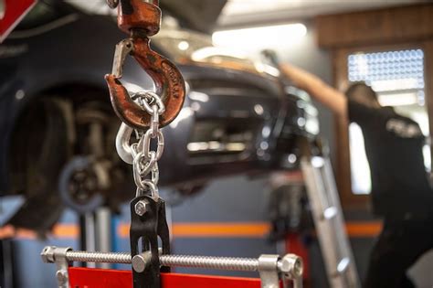 Premium Photo Engine Hoist Chain Detail In Workshop