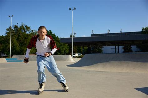 Premium Photo Trendy Fashioned Teenage Guy Rollerblading At Urban