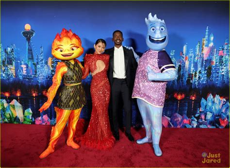 Leah Lewis And Mamoudou Athie Pose With Their Characters At Elemental