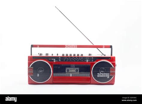 Red Vintage Cassette Player With Open Antenna Isolated On White