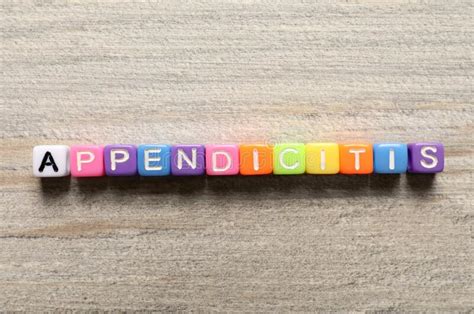 Word Appendicitis Made Of Color Cubes With Letters On Wooden Table Top