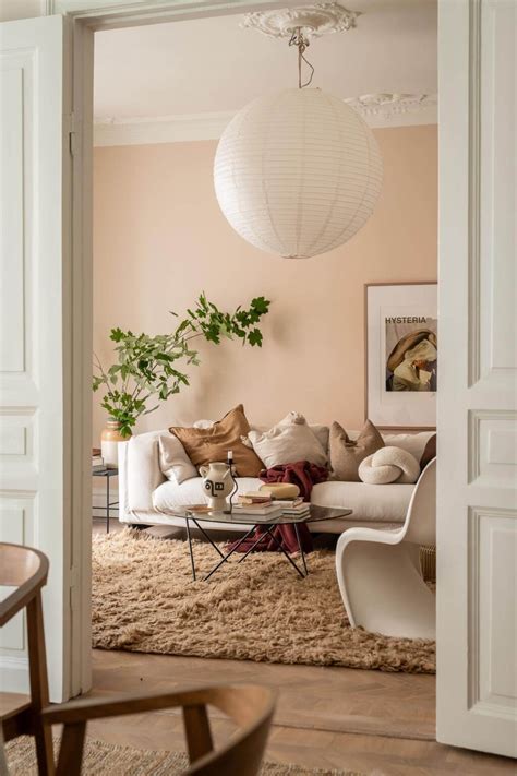 A Spacious Renovated Apartment With A Light Pink Living Room The Nordroom