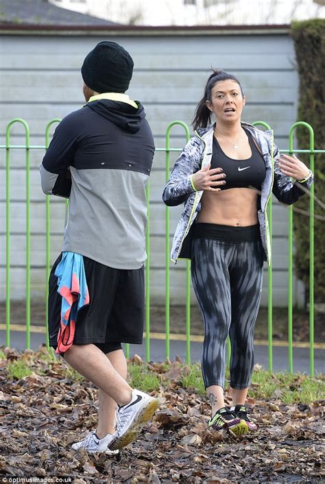 Kym Marsh Flashes Her Abs As She Completes Set Of Pull Ups In The Park
