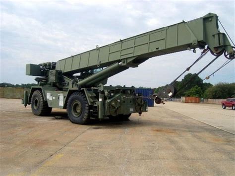Army Truck With Crane In Parking Lot Army Crane Standard Military