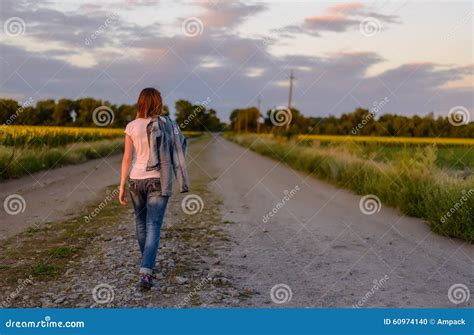 Girl Walking Down The Street