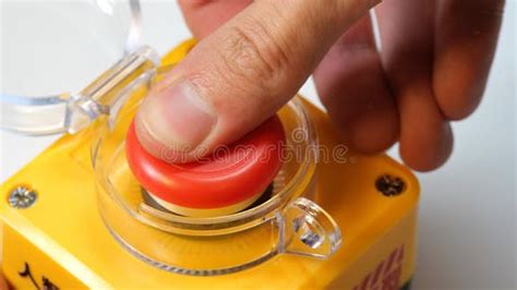 Closeup Of A Finger Hand Pressing A Red Nuclear Weapon Missile Launch