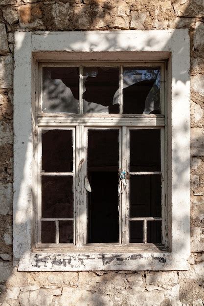 Premium Photo Broken Window Glasses Of An Abandoned House