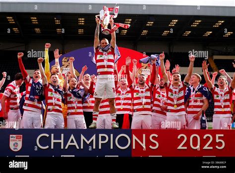 Doncaster Rovers Billy Sharp Lifts The Trophy After The Sky Bet League