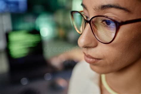 Close Up of Middle Eastern Female Programmer Wearing Glasses while Working in Office Stock Photo ...