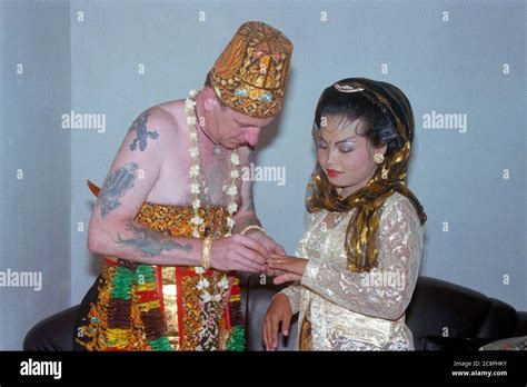 Traditional Javanese Wedding Ceremony Between Mixed Race Couple In