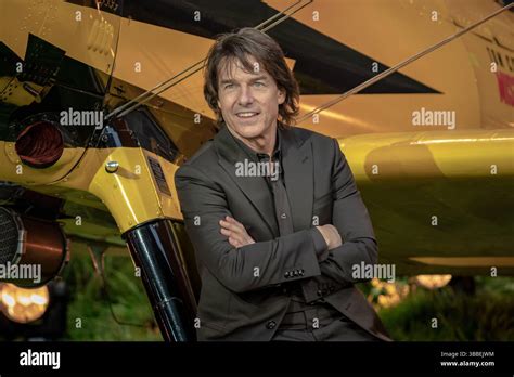 London Uk 15th May 2025 Tom Cruise Poses With A Yellow Stunt