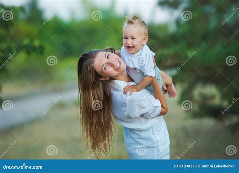 Happy Mother Playing With Her Son In The Park Stock Image Image Of