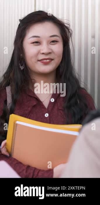 University Students Talking And Having Fun Together After Having