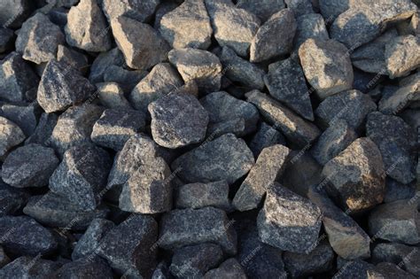 Premium Photo A Concrete Material Aggregate Stone Background