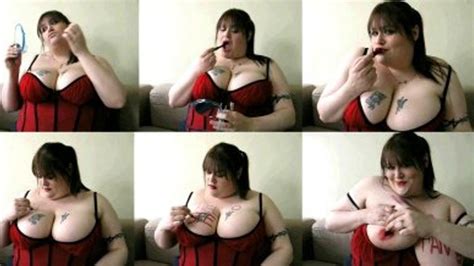 A Fetish Den Applying Lipstick Topless Dial Up Version