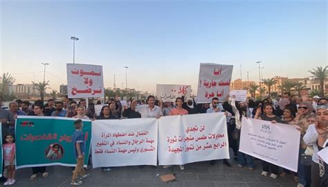 خۆپیشاندەرێک پەرلەمانی عێراق دەیەوێت مافەکانی ژنان و منداڵان زەوت بکات ژن