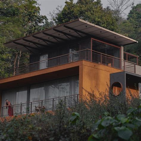 Sloping Roof Shelters House Of Noufal In India By Dor Concepts