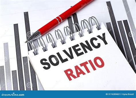 Solvency Ratio Text On Notebook On Chart With Pen Stock Image Image