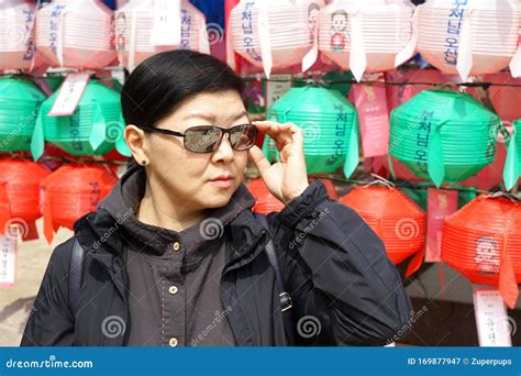 Korean Woman In Sunglasses And Paper Lanterns Editorial Photography