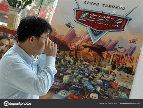 File Chinese Man Walks Poster Pixars Movie Cars Disney Enterprises — Stock Editorial Photo