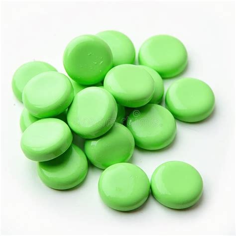 A Stack Of Uniform Round Glossy Green Candies On A Plain White Background Generative Ai