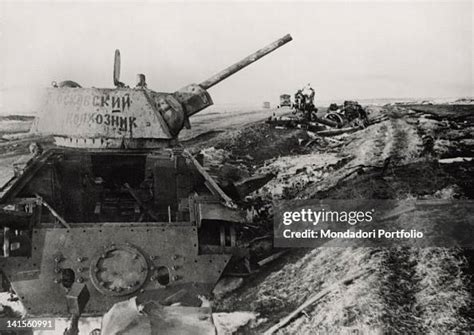 The Wreck Of A Soviet Tank Lying By The Side Of A Road In The Area