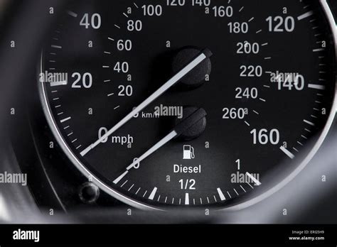 A Car Speedo Speedometer Showing An Empty Tank Of Diesel Fuel Stock
