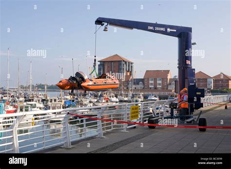Rnli Inflatable Lifeboat Being Launched At Roker Marina Sunderland Using A Welin Lambie Crane