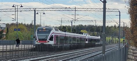 A Vr Class Sm5 Staedler Rail Flirt Passing Savio Station Rtrains