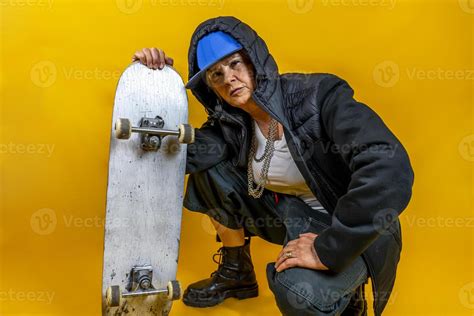 Beautiful Middle Aged Woman In Black Hoodie Poses As Rapper Playing