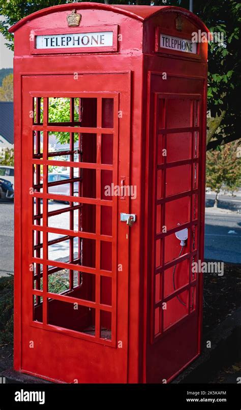 Classic British Red Phone Booth On A City Street Traditional Red British Telephone Box