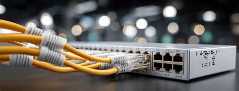 Yellow Network Cables Are Connected To The Back Panel Of A Server Rack