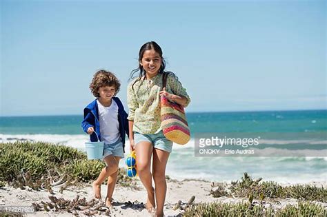 Brother Sister Beach Photos And Premium High Res Pictures Getty Images