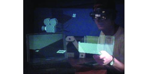 The Emmie System For Collaborative Augmented Environments Here We See