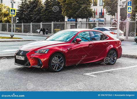 Red Car Lexus Is 300 Is Standing On City Parking Front Side View